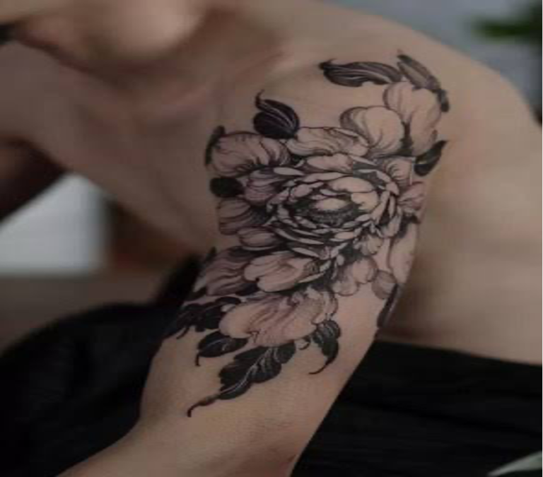 A Tattoo Artist's Guide to Designing Large Flower Tattoos